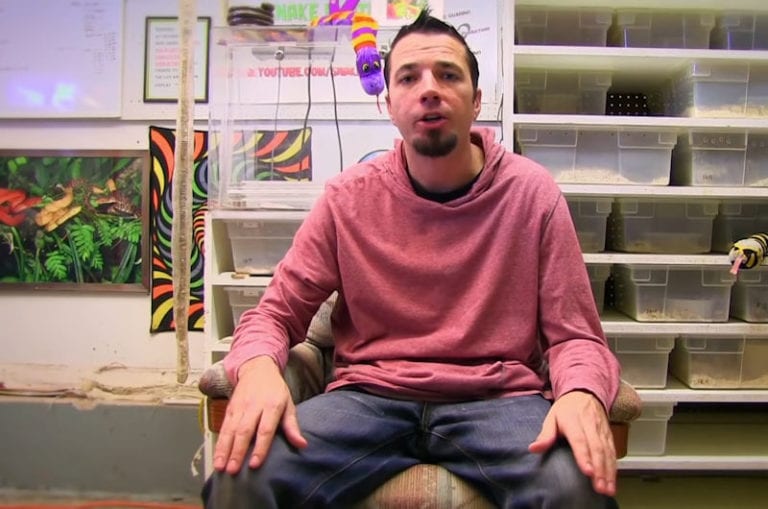 Dad defends decision to let his 13-foot pet python wrap itself around ...