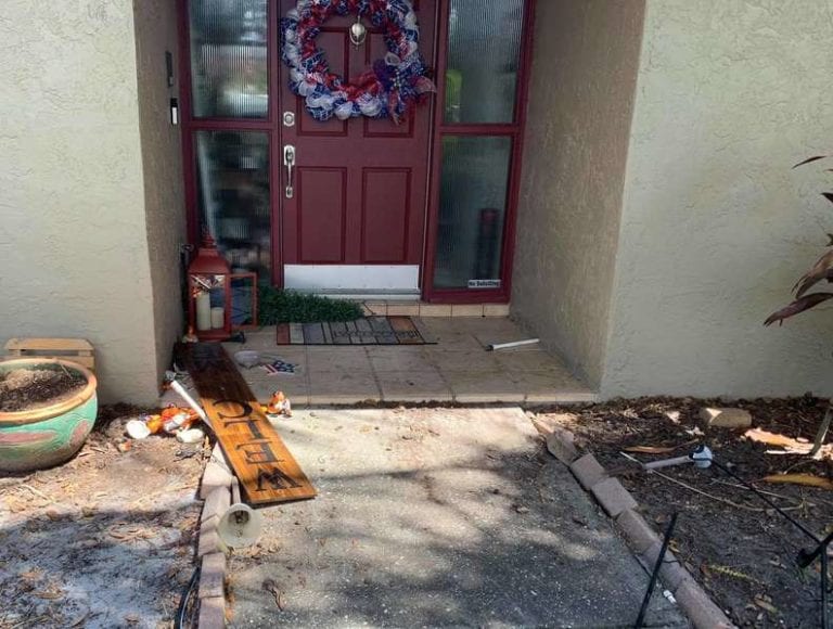 Family opens front door and finds 8-foot alligator waiting for them
