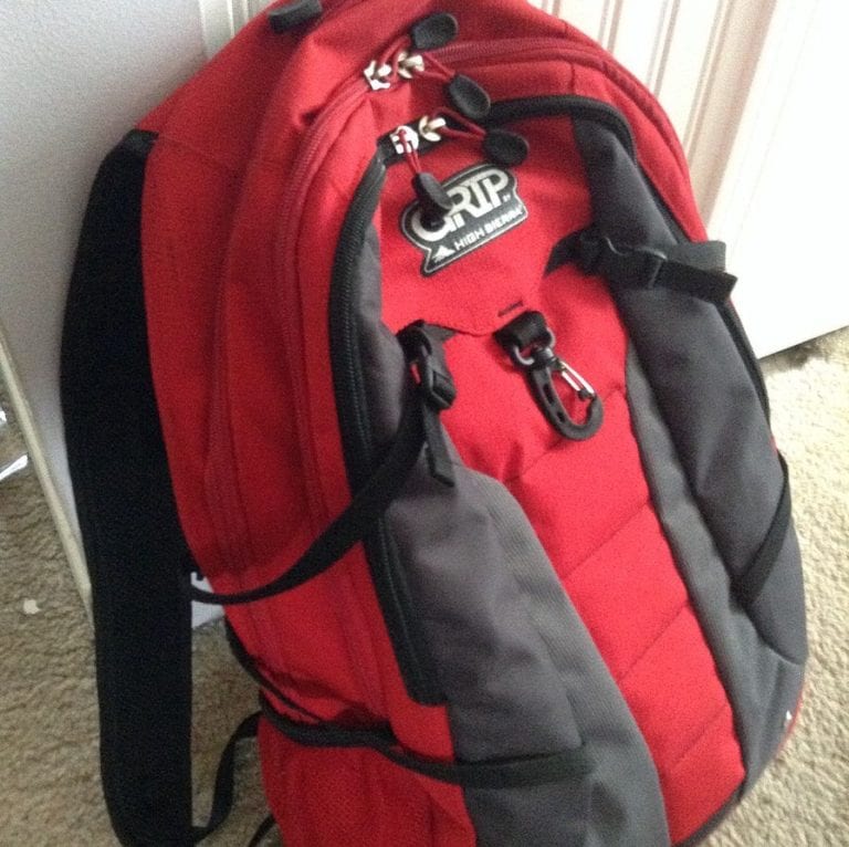 Garbage collector halts in his tracks upon sight of dumped backpack ...