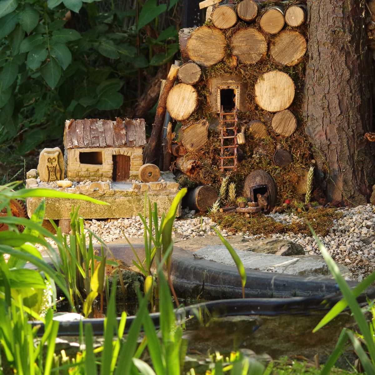 Man Builds Enchanting Village For Mouse He Found In His Garden