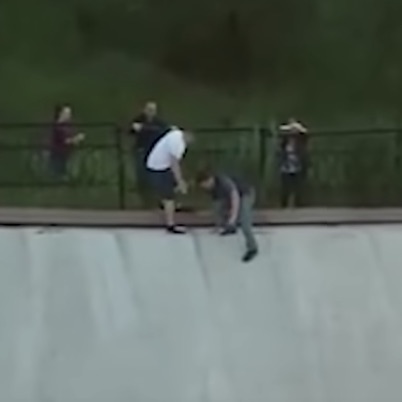 Onlookers form incredible human chain to save dog trapped in reservoir